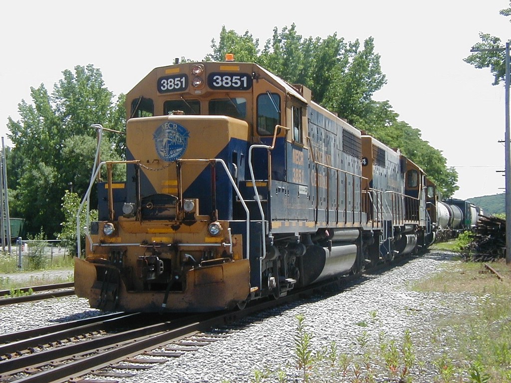 NECR 3851 3844 3847 & train enter a siding in the yard